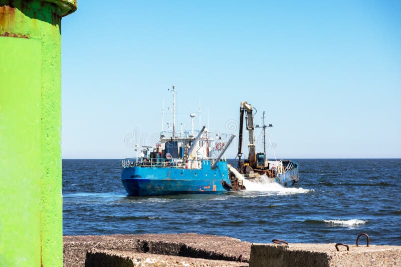 A Big Blue Ship in Waves in a Blue Ocean Stock Image - Image of ...