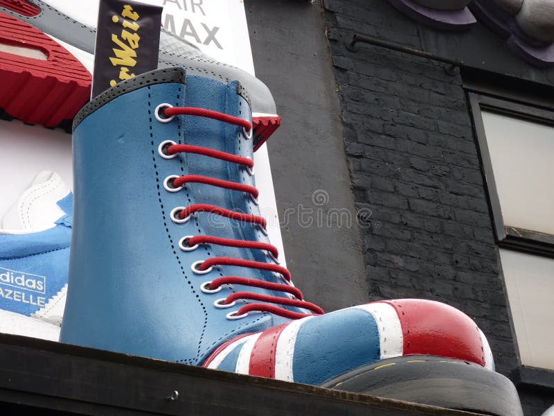 Big Blue Sports Boot on a Ledge Editorial Stock Photo - Image of boot ...