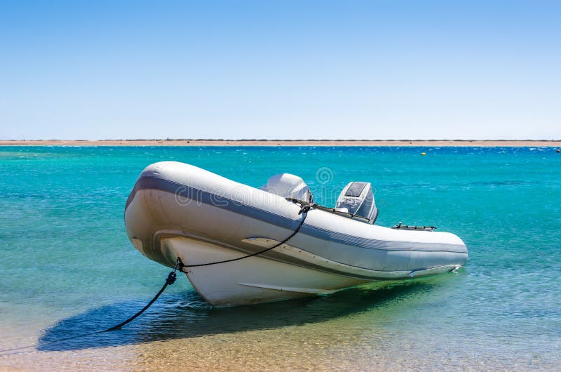 Big Boat with a Motor Tied at the Seashore in Egypt Stock Photo - Image ...