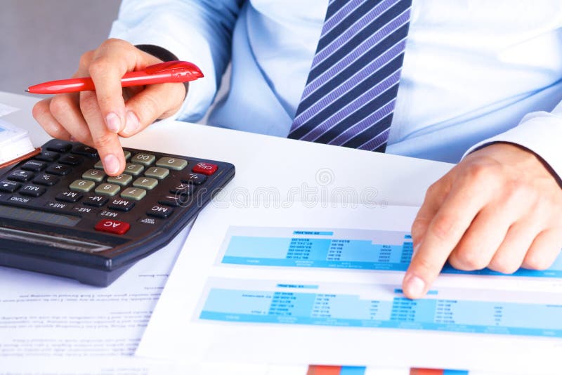 Big Boss Checks Calculations on a Calculator Stock Image - Image of ...