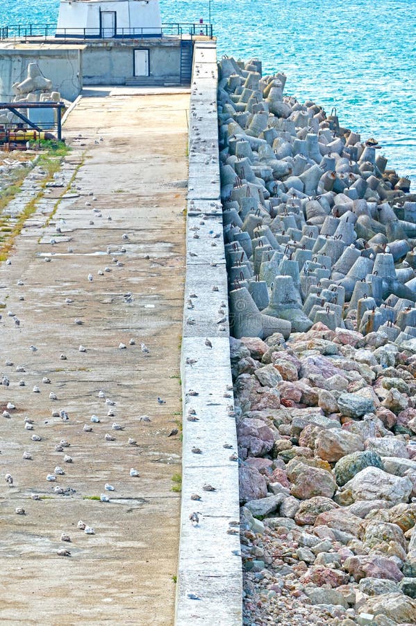 Big breakwater on the sea stock image. Image of wave - 163668349
