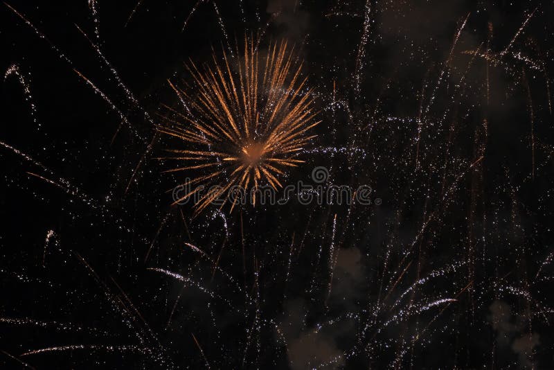 A Firework Star Burst at Night Stock Photo - Image of firework, star ...