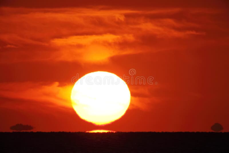 Big bright setting sun stock image. Image of photograph - 34085685