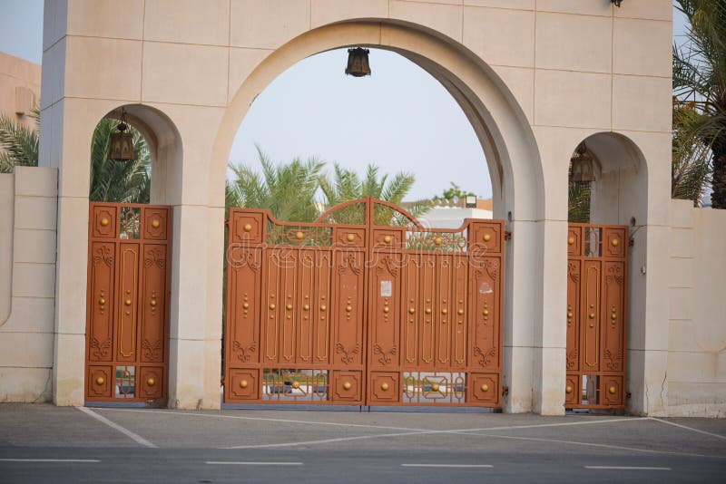Big bronze house gate stock photo. Image of landscape - 185732782