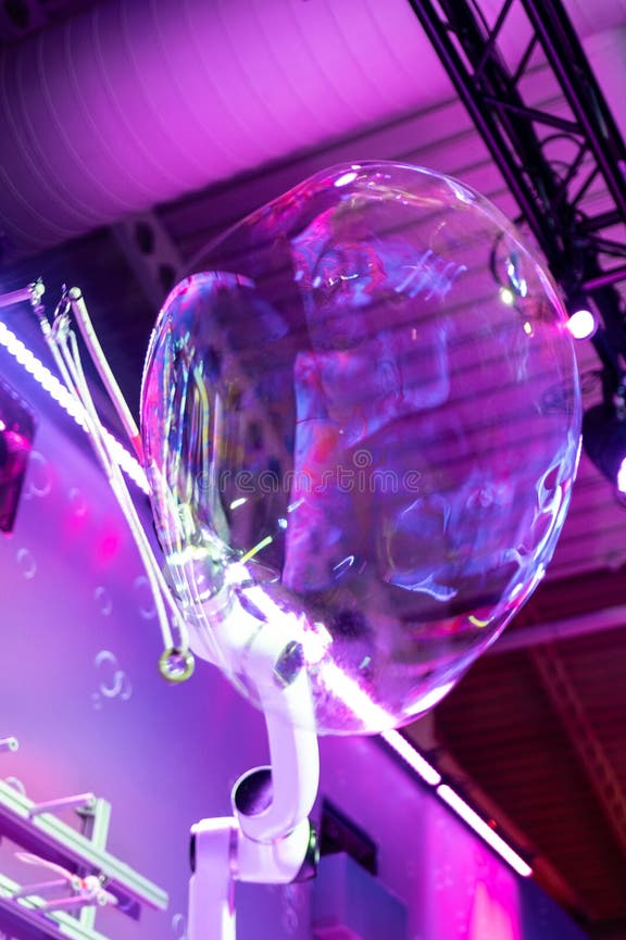 Big Bubble Floating on a Studio Ceiling with Light Focus Stock Photo ...
