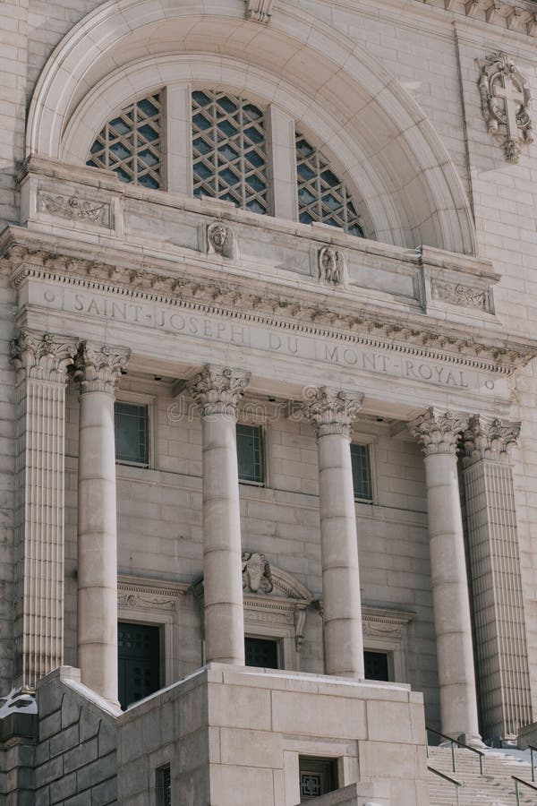 A Big Building with Some White Columns and Stairs in Front Stock Image ...