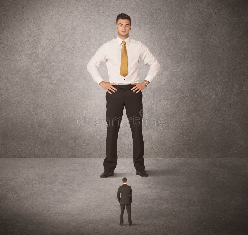 Big Business Man Looking at Small Worker Stock Photo - Image of ...