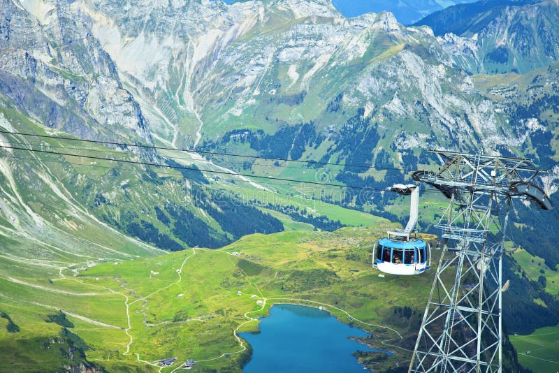 Big cable car in the Alps stock image. Image of lake - 21082393