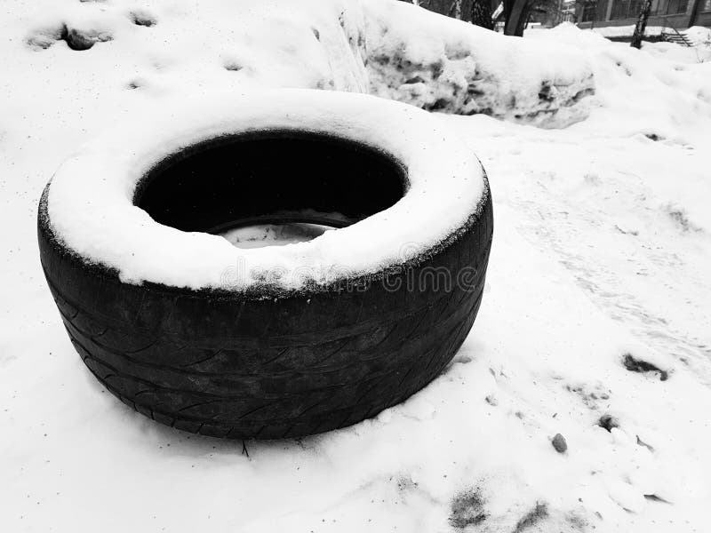 Big Car Tire on Snow in Winter Stock Photo - Image of december, risk ...