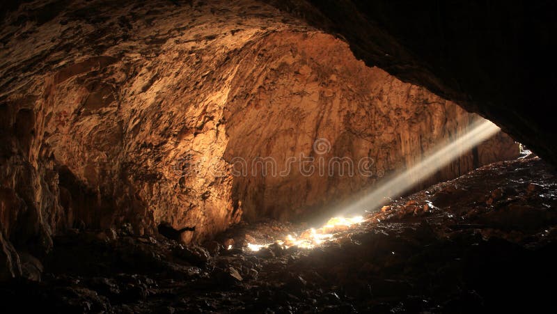 Big Cave with Bright Sunbeam from Entrance Stock Photo - Image of rock ...