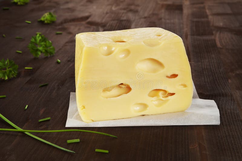 Big cheese. Emmentaler. stock photo. Image of fresh, portion - 19452460
