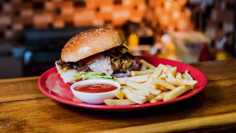 Big Cheeseburger and Chips on a Plate. Stock Photo - Image of ...