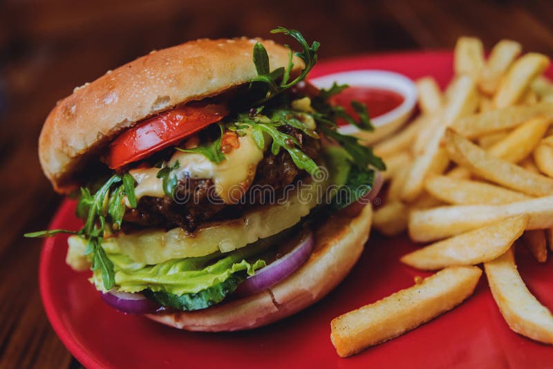 Big Cheeseburger and Chips on a Plate. Stock Photo - Image of american ...