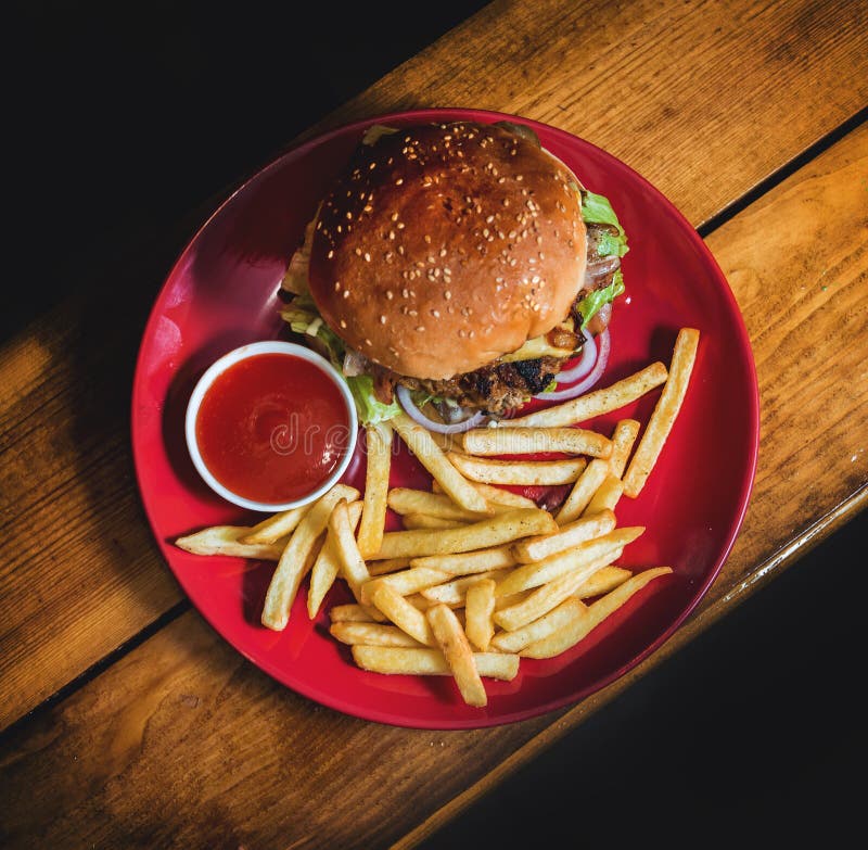 Big Cheeseburger and Chips on a Plate. Stock Image - Image of american ...