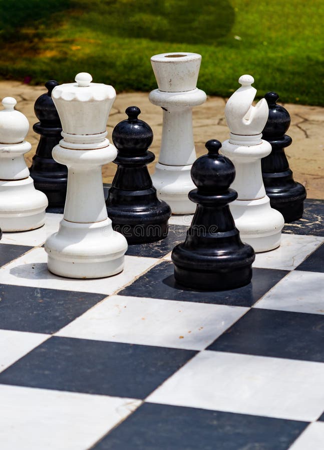 Big Chess On The Board Located On The Ground Stock Photo - Image of ...