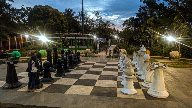 A Big Chess Board in Midle of Park Editorial Photo - Image of board ...