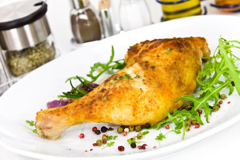A Big Chicken Leg- Roasted with Arugula Stock Image - Image of meal ...
