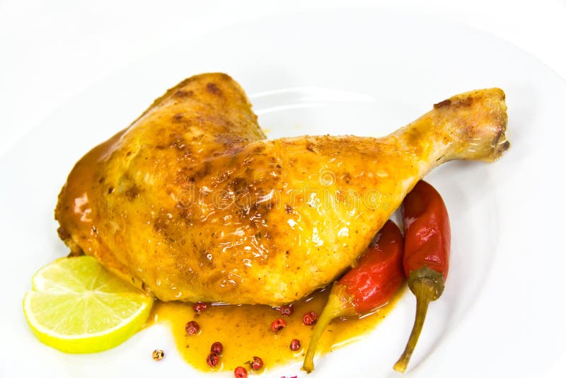 A Big Chicken Leg- Roasted with Red Peppers Stock Photo - Image of ...