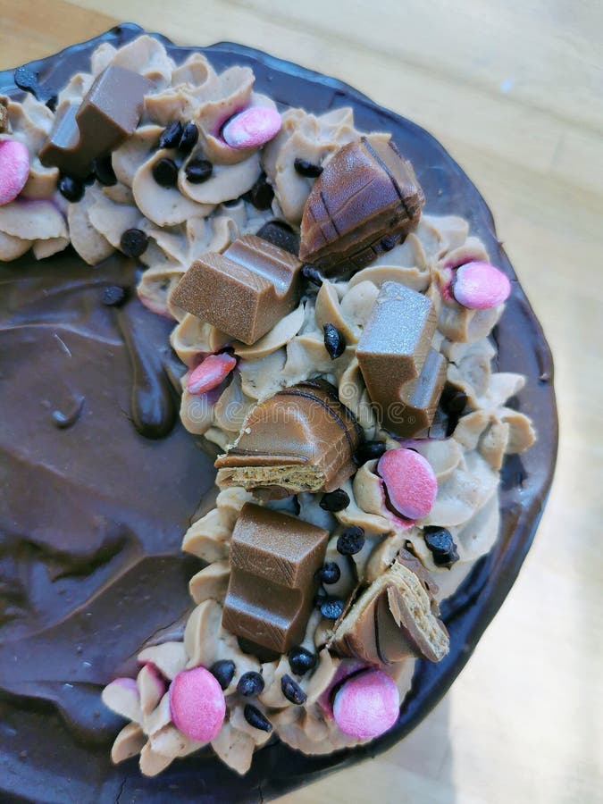 Big chocolate cake stock image. Image of chocolate, layered - 276972091