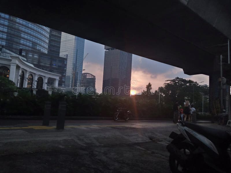 Sunset under the flyover stock image. Image of darkness - 230813381