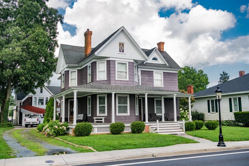 Big Classic American Two Level House with Terrace and Lawn in the Front ...