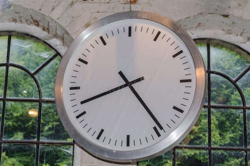 Clock in factory hall stock image. Image of light, hall - 10625327