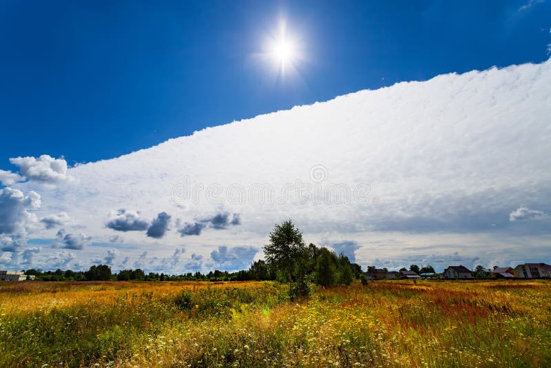 Big Clouds in the Sky. Two Types of Clouds Over a Field on a Sunny ...