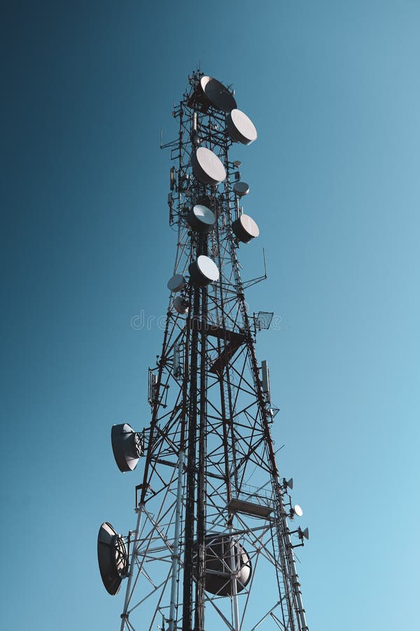 A Big Communication Tower with a Lot of GSM and Internet Antennas Stock ...