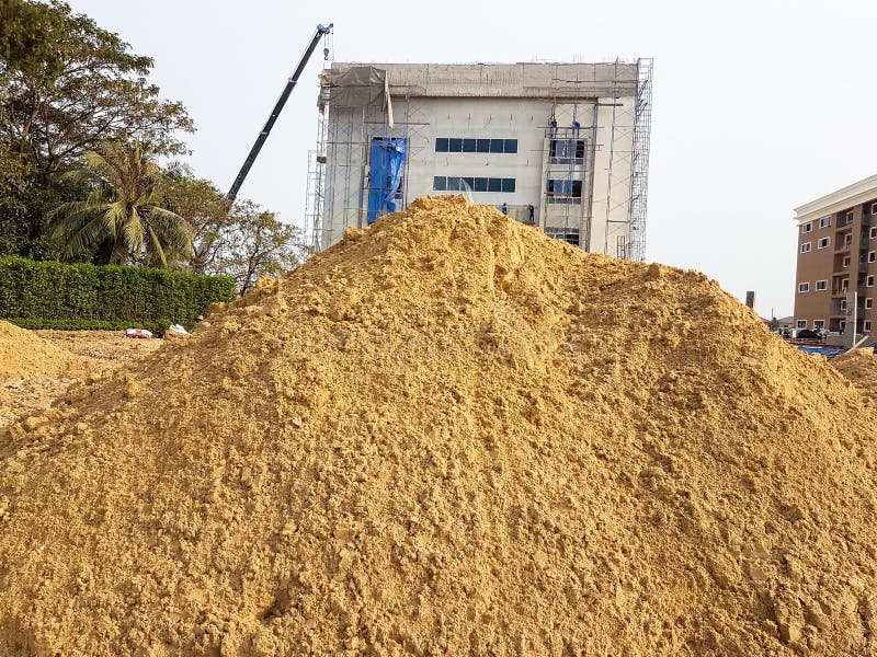 Big Construction Sand with the Worker on Construction Building Stock ...