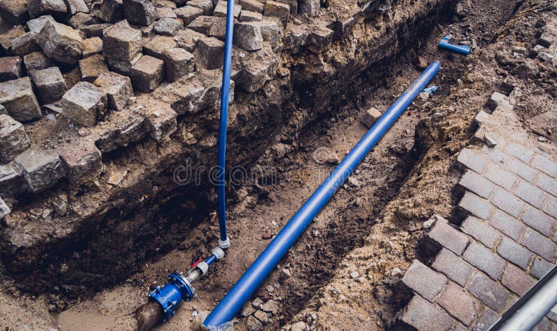 Big Construction Site with Pipes and Wires in the Construction Area ...