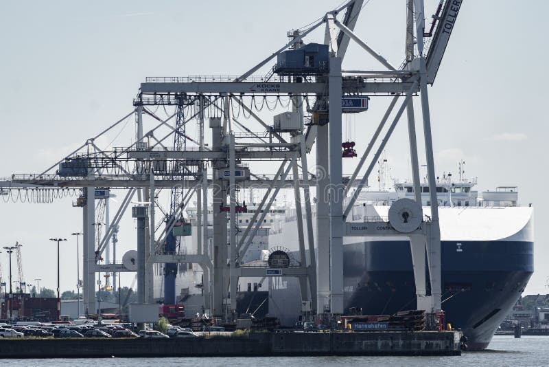 Big Container Ship in the Process of Loading by Cranes at the Port of ...