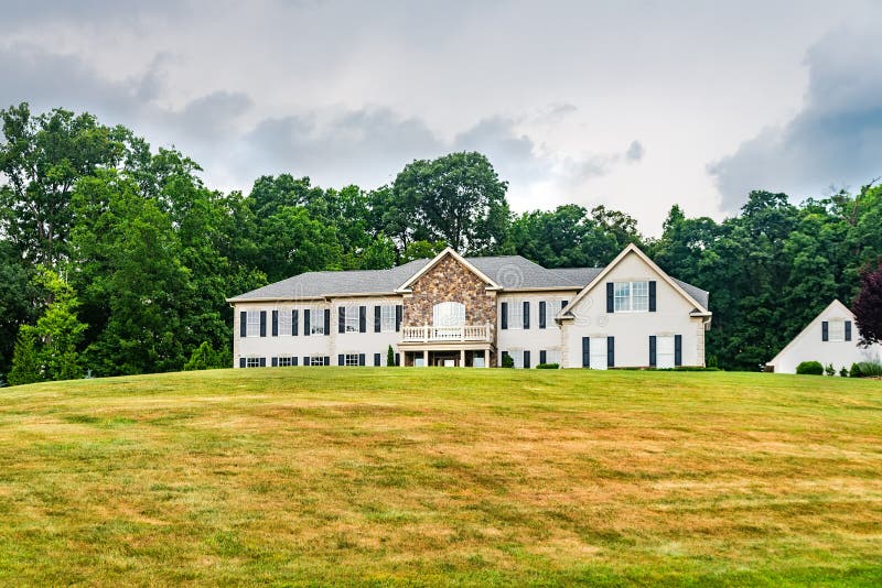 Big Country House with a Large Green Lawn in the Front Yard Stock Photo ...