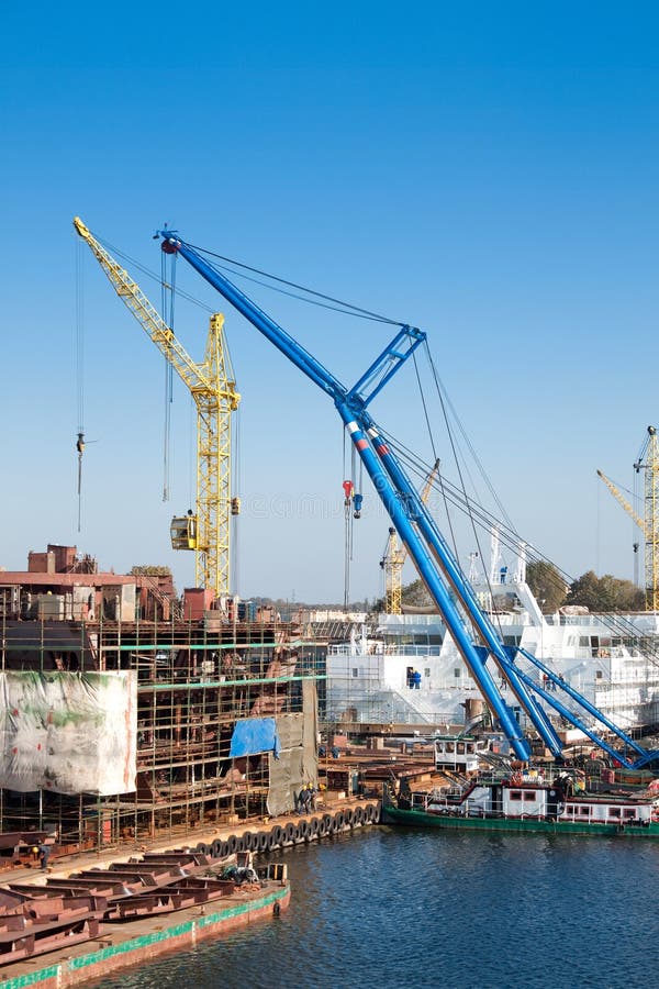Big cranes in shipyard stock photo. Image of steel, high - 16550204