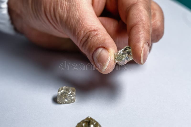 Big Diamond in Hand. Natural Rough Diamonds Stock Image - Image of ...