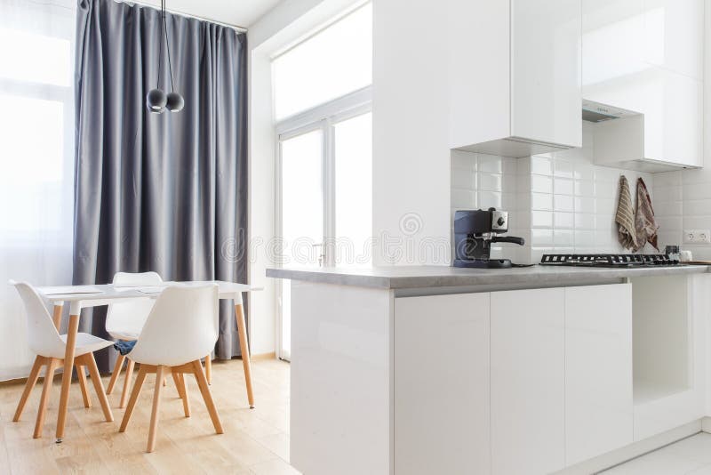 Big Dining Room with the Kitchen Wall on the Right Side and the Table ...