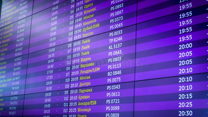 Big Display with Timetable of Airplane Flights in Airport Terminal ...