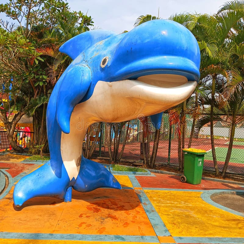 The Big Dolphin Statue in the House Swimming Pool Stock Photo - Image ...