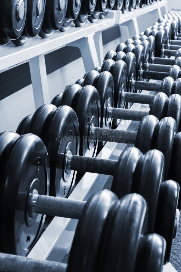 Heavy sports dumbbells stock image. Image of power, muscular - 3834683