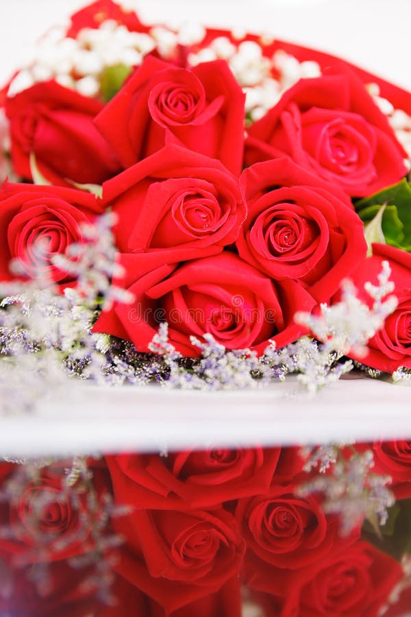 A Big, Elegance and Luxury Bouquet Made of Red Roses with Reflection on ...