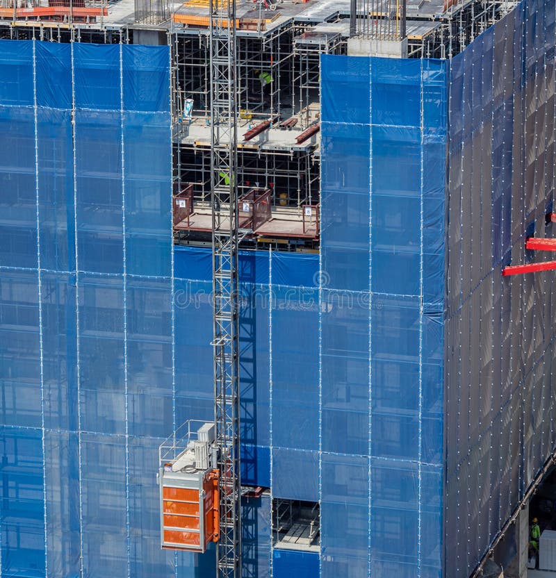 Big Elevator on the Exterior of a New Building Construction Stock Photo ...