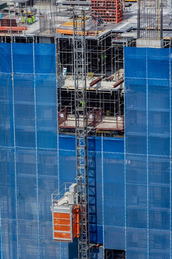 Big Elevator on the Exterior of a New Building Construction Stock Image ...