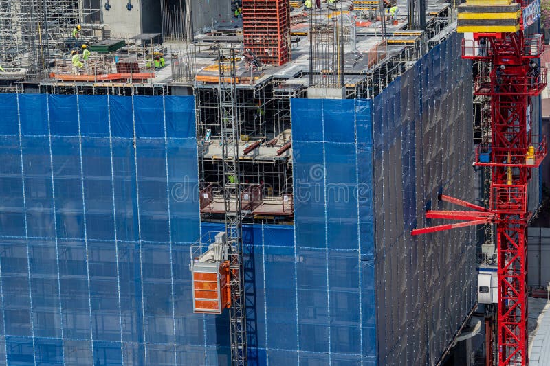 Big Elevator on the Exterior of a New Building Construction Stock Photo ...