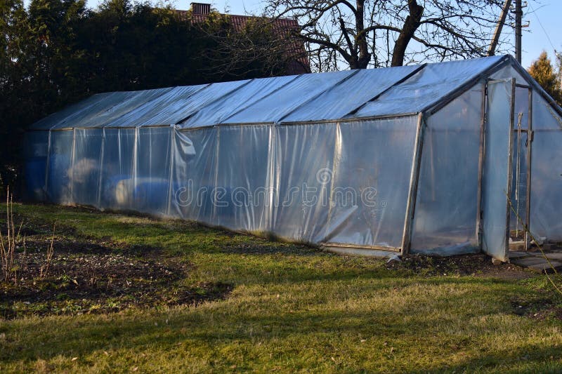 Big Empty Green House Garden for Plants Covered with Plastic with Open ...