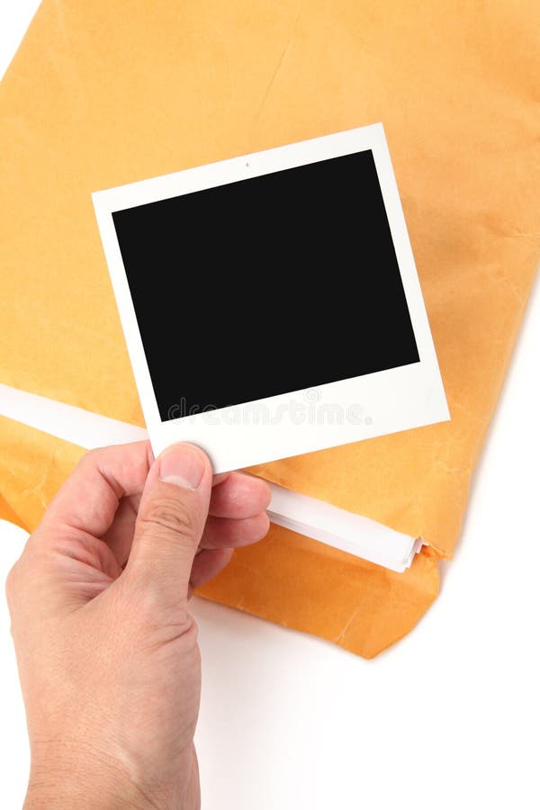A Polaroid Photo and File Folder Stock Image - Image of office ...