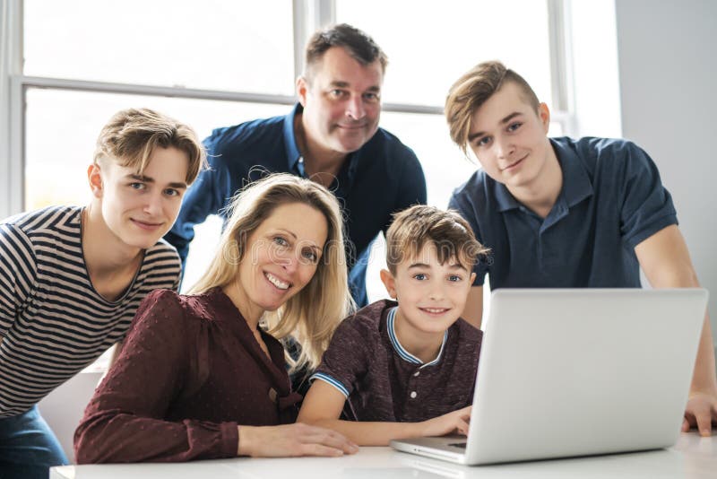 A Big Family Looking in Computer at Home Stock Image - Image of indoors ...