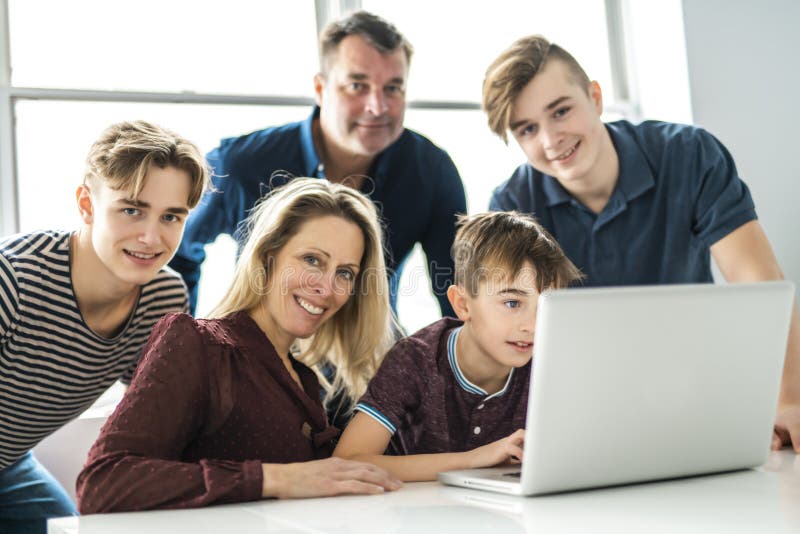 A Big Family Looking in Computer at Home Stock Image - Image of home ...