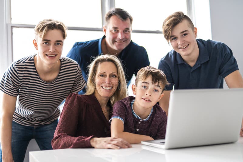 A Big Family Looking in Computer at Home Stock Image - Image of living ...