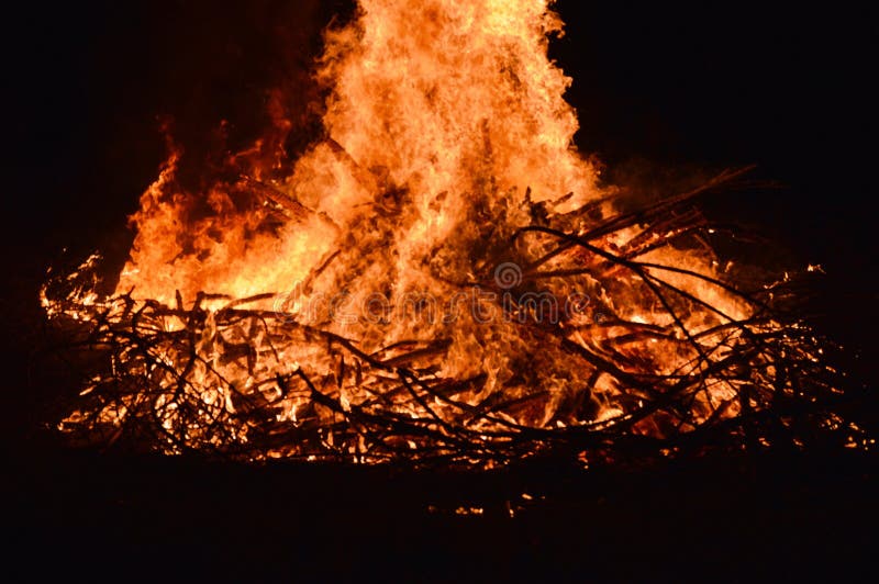 Big fire lit at night stock image. Image of wildfire - 381800749