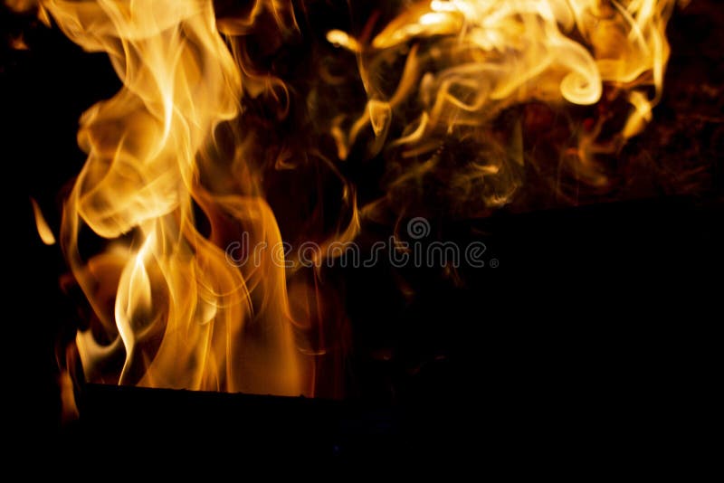Big Fire and Silhouette of Brazier on Black Background. Flame of Fire ...
