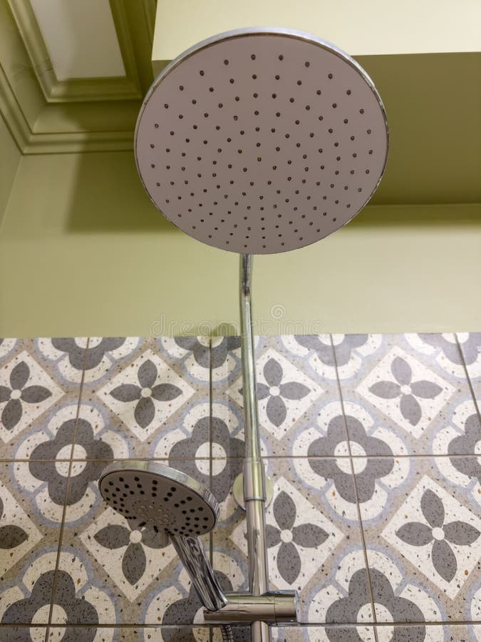 Two Different Shower Heads in Domestic Shower Against Tiled Wall Stock ...